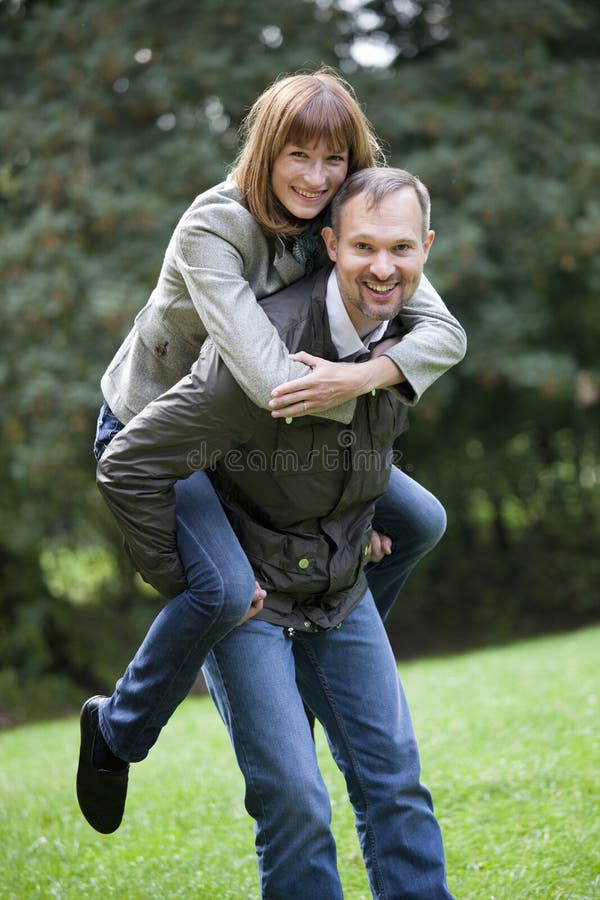 Happy couple outdoors stock image. Image of summer, love - 10899879