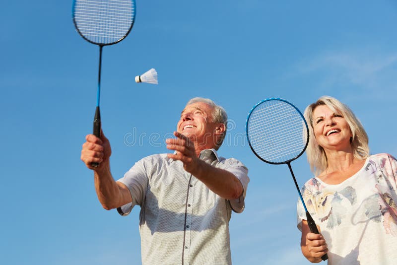 Happy Couple Playing Badminton Stock Image - Image of badminton, couple ...