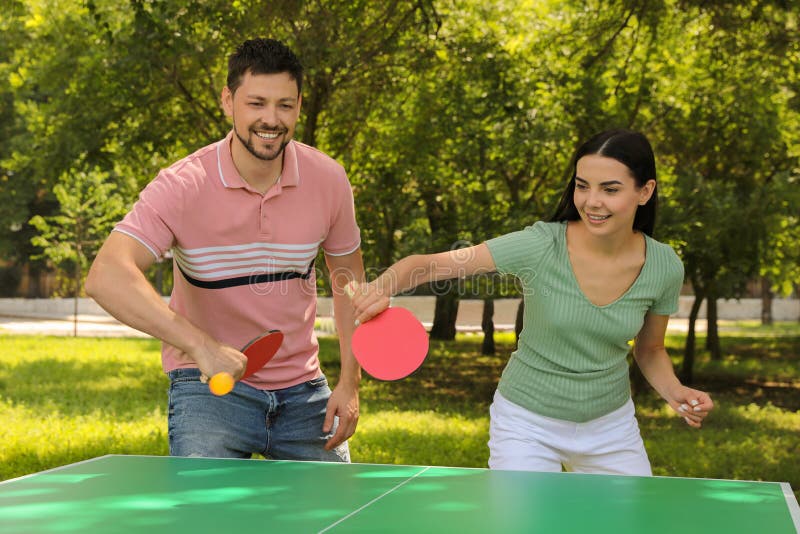 Happy Couple Playing Ping Pong in Park Stock Image - Image of people ...