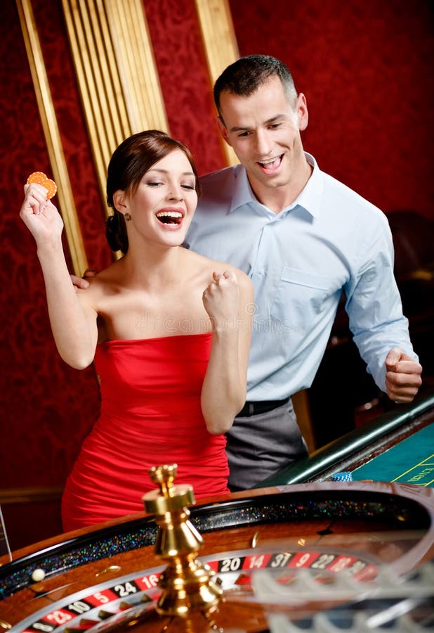 Happy Couple Playing Roulette Wins Stock Photo - Image of caucasian ...