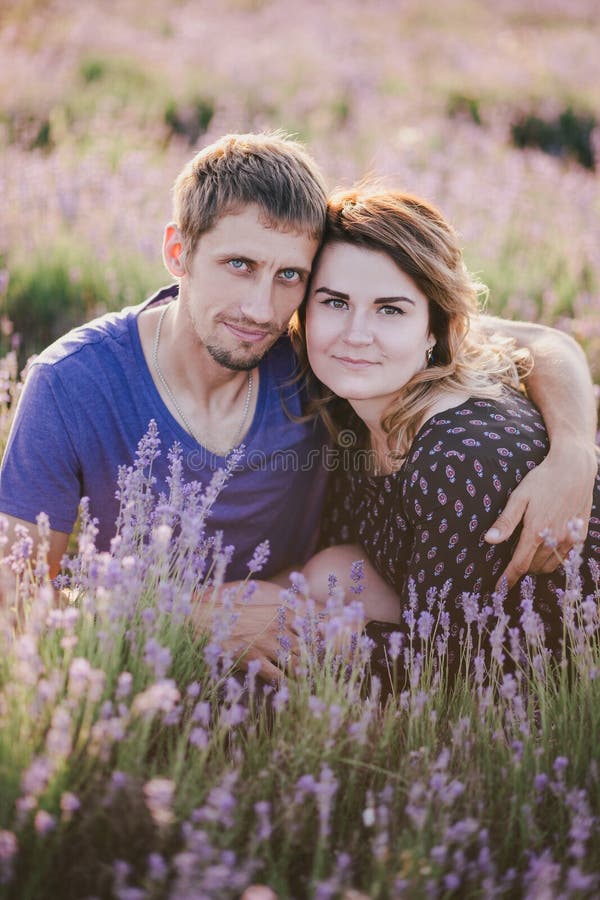 Happy Couple Posing in a Lavender Field Stock Photo - Image of date ...