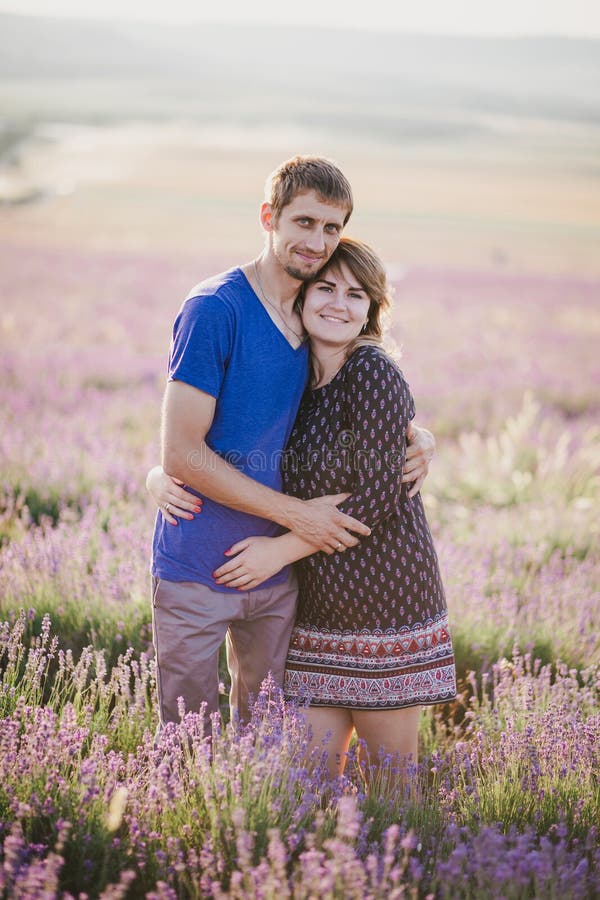 Happy Couple Posing in a Lavender Field Stock Photo - Image of grass ...
