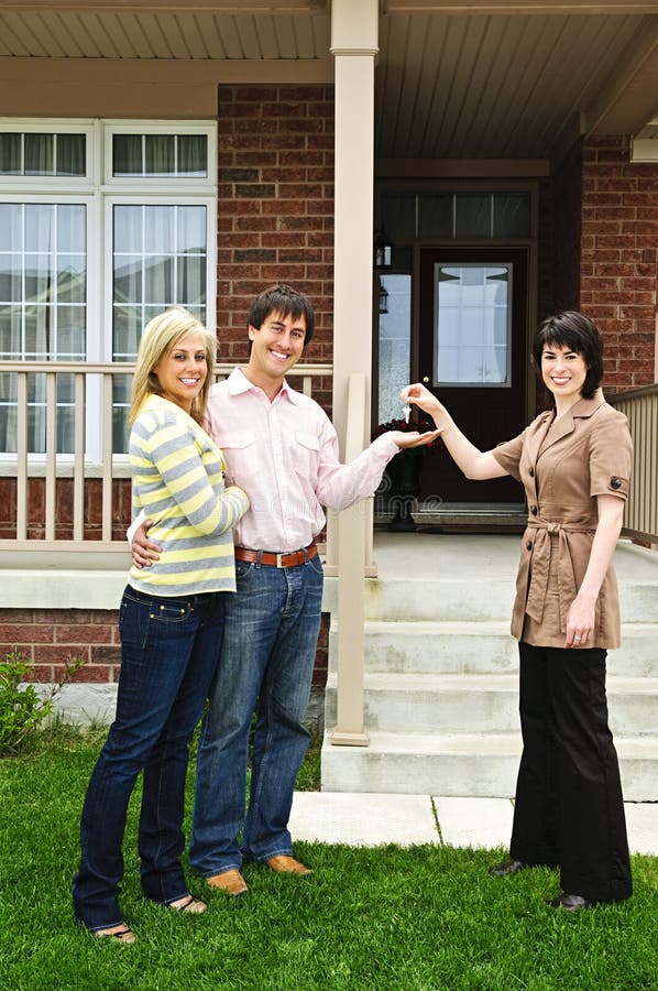Happy Couple with Real Estate Agent Stock Photo - Image of estate, real ...