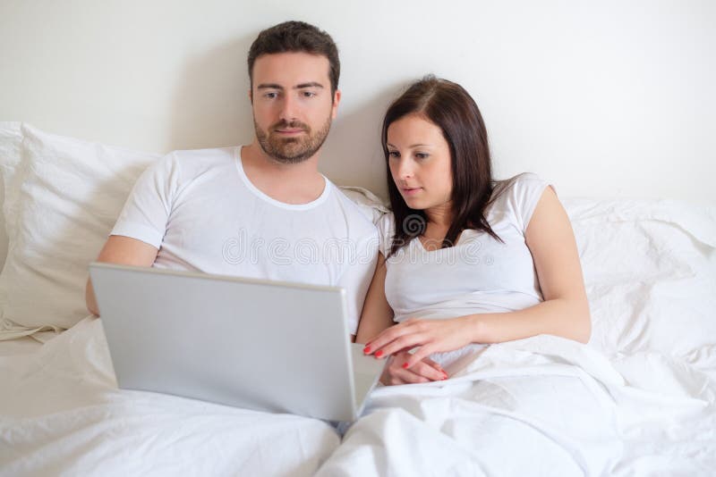 Happy Couple Searching for Consumer Advice in Internet Stock Photo ...