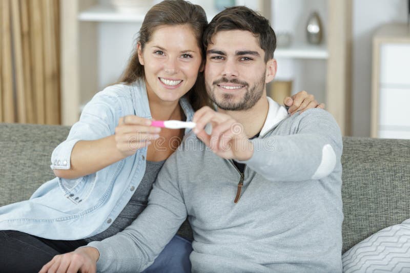 Happy Couple Showing Pregnancy Test Stock Image - Image of couplelove ...