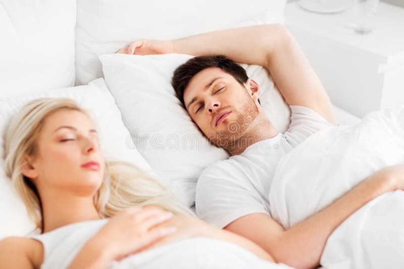 Happy Couple Sleeping in Bed at Home Stock Photo - Image of relax ...