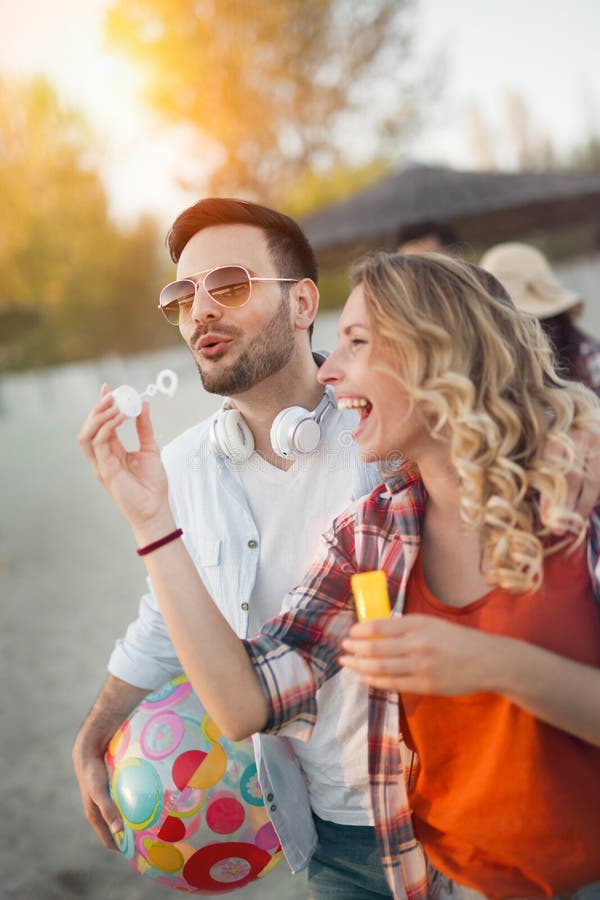 Happy Couple Smiling and Having Fun Time Stock Image - Image of bubbles ...