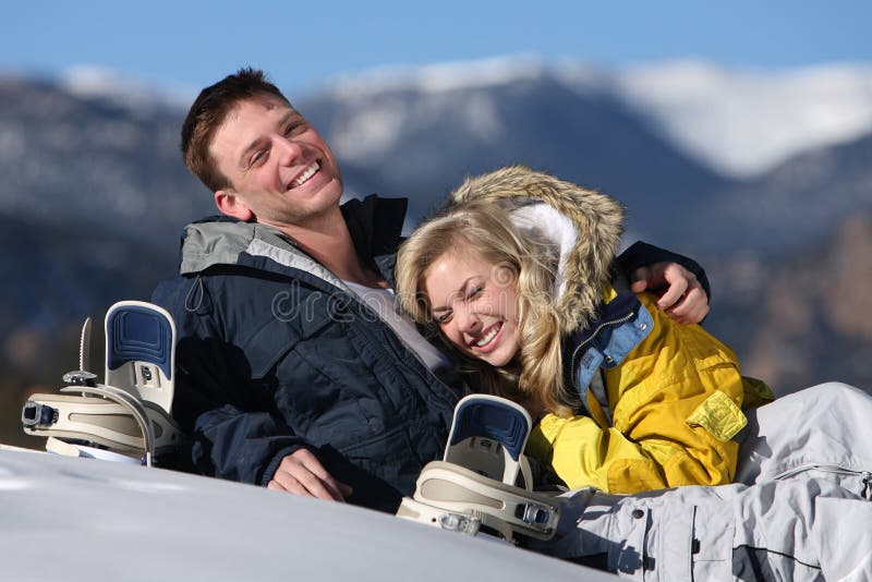 Happy Couple Snowboarding at Ski Resort Stock Image - Image of ...