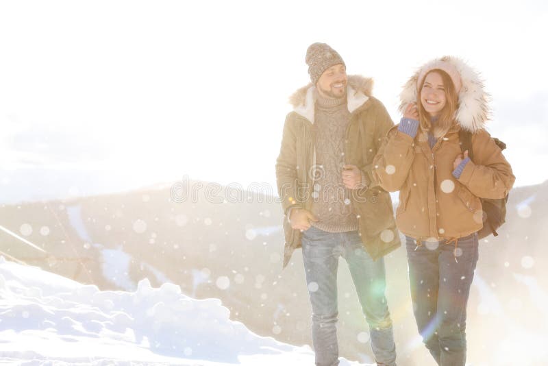 Happy Couple Spending Winter Vacation Together in Mountains. Stock ...
