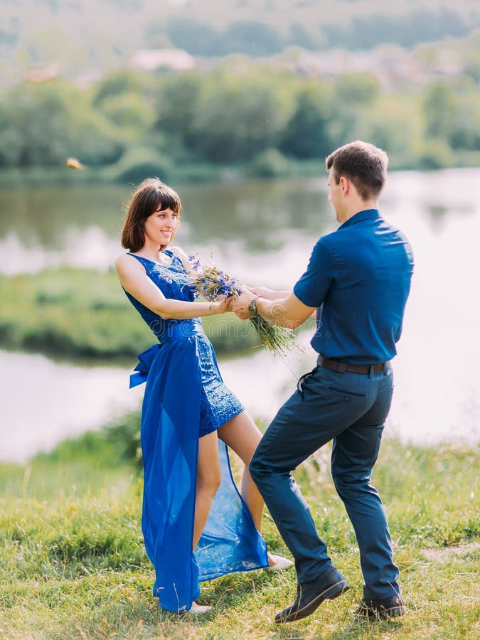 Happy Couple is Spinning Round. the Full-length View. Stock Image ...