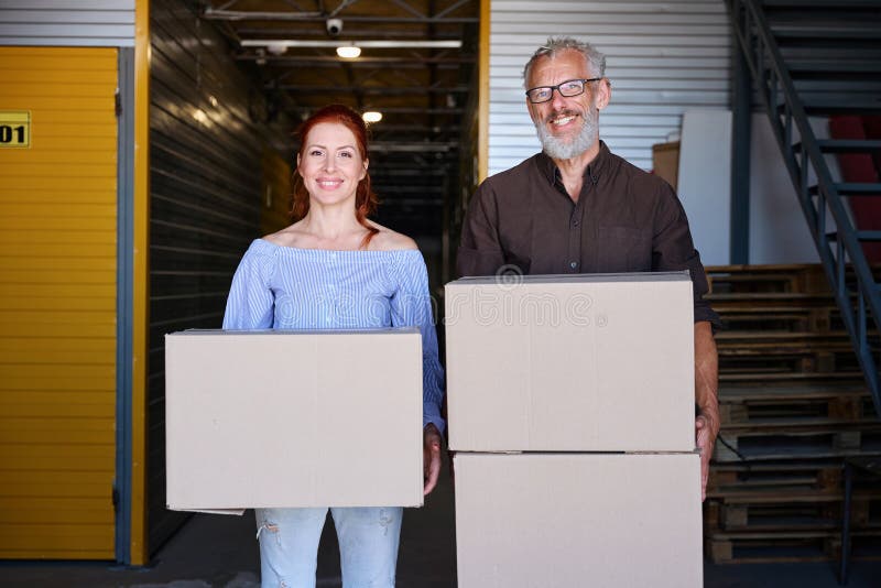 Happy Couple is in Storage Warehouse Stock Photo - Image of warehouse ...