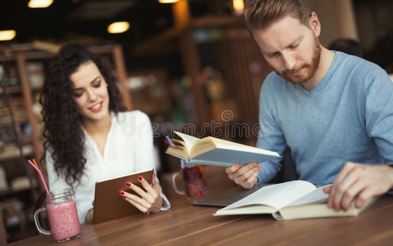 Happy Couple Studying in Library Stock Photo - Image of exam, campus ...