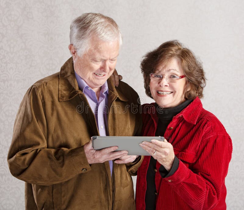 Happy Couple with Tablet stock photo. Image of person - 43595044