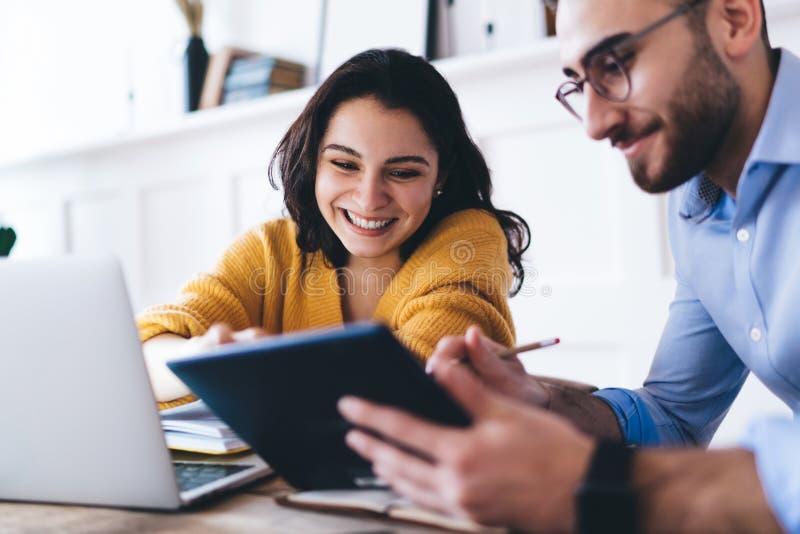 Happy Couple Taking Notes and Browsing Gadgets Stock Image - Image of ...