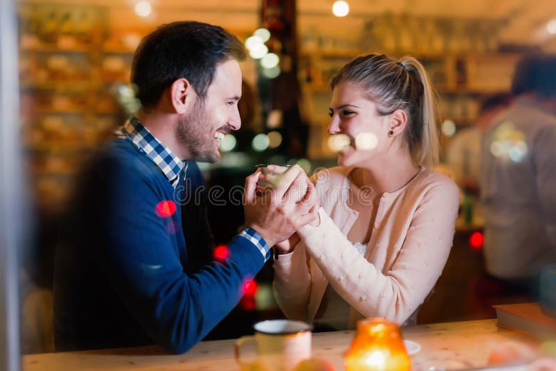 Happy Couple Talking at Bar and Having Date Stock Image - Image of ...
