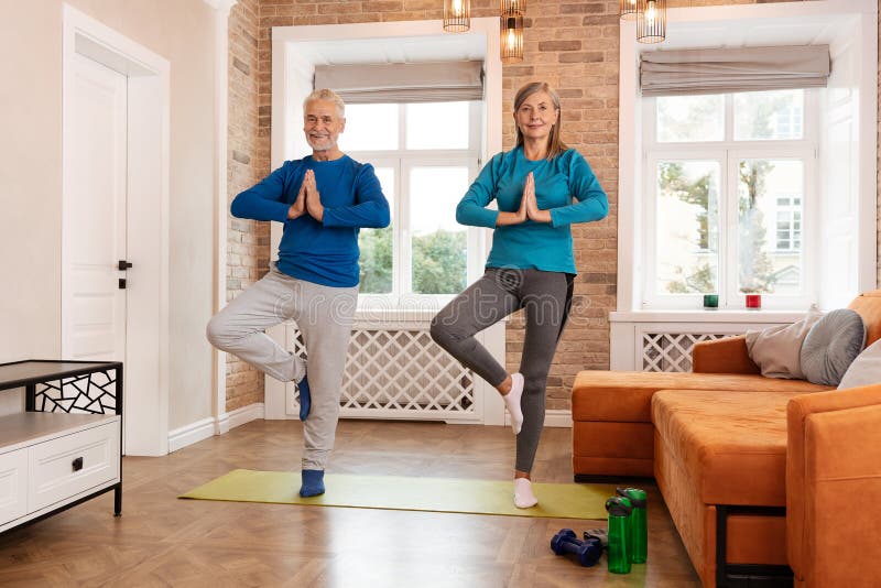 Happy Couple in Tree Pose Standing on One Leg. Stock Image - Image of ...