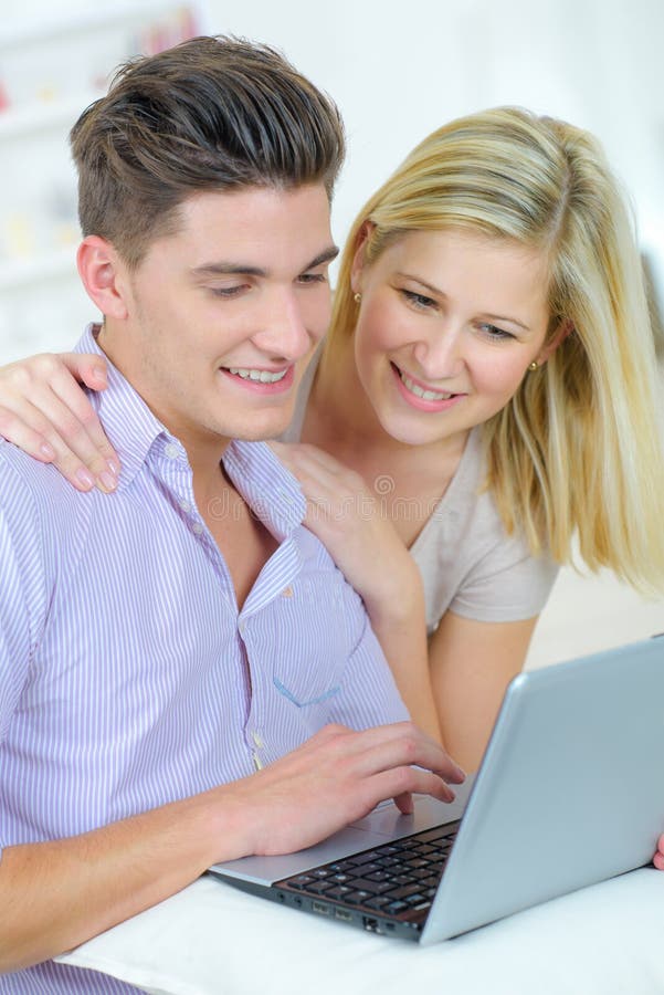 Happy Couple Using Computer Stock Photo - Image of togetherness, chat ...