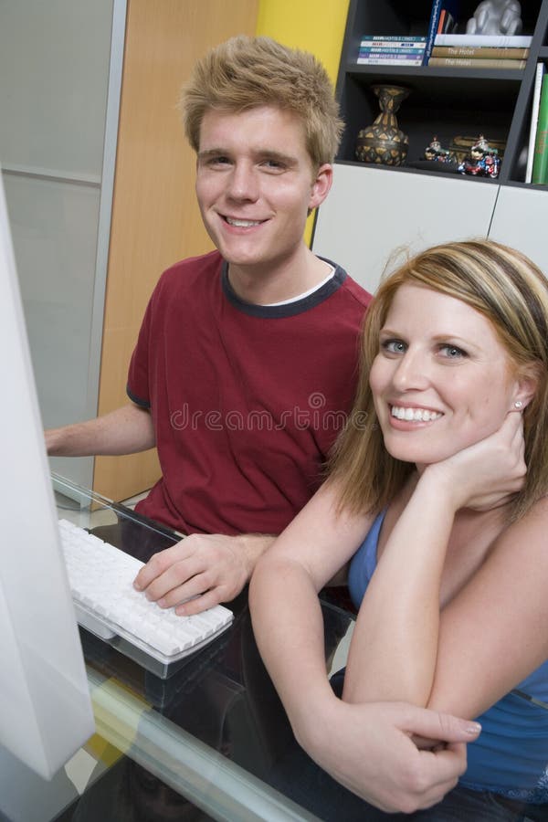 Happy Couple Using Computer Stock Photo - Image of male, couple: 29650414