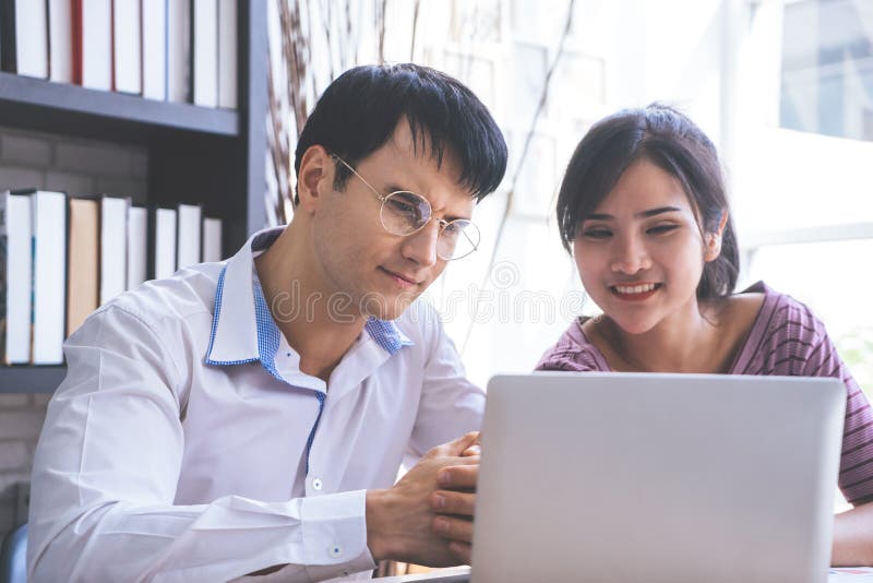Happy Couple Using Computer Working Together at Home Stock Image ...