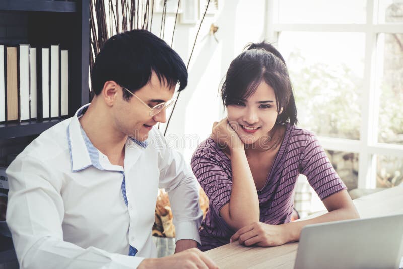Happy Couple Using Computer Working Together at Home Stock Image ...