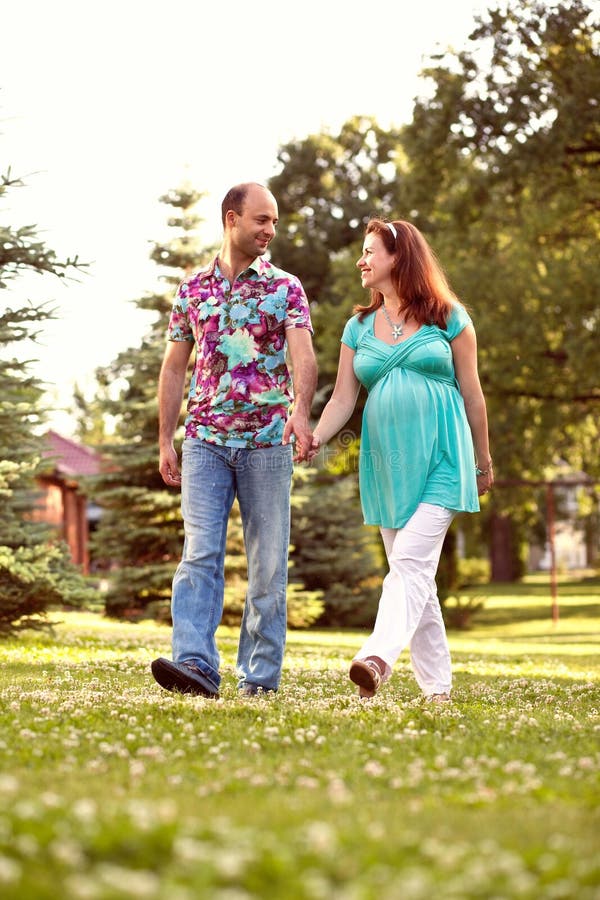 Happy couple walk in park stock image. Image of joined - 15356245