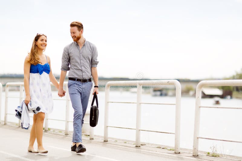 Happy Couple Walking Outdoors Stock Image - Image of caucasian, sensual ...