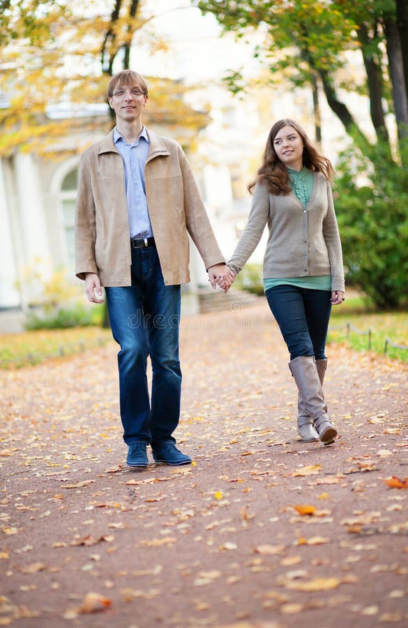 Happy Couple Walking in Park Stock Image - Image of fall, city: 28981419