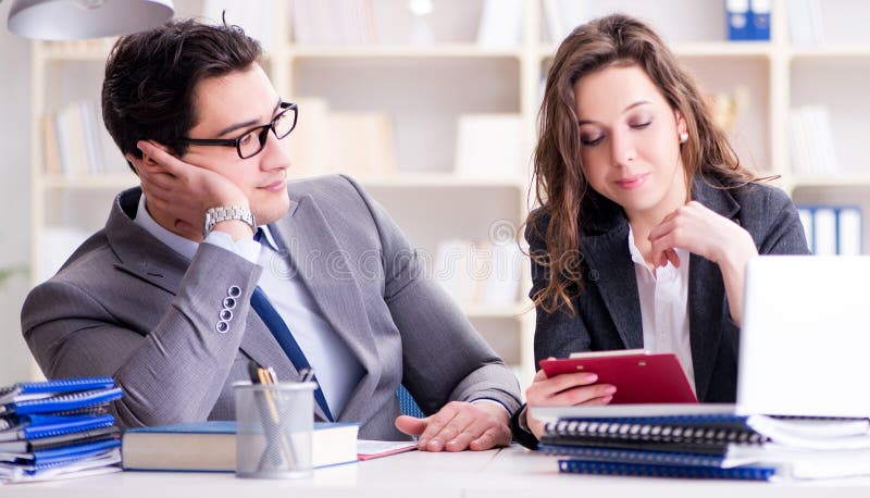 The Happy Couple Working in the Same Office Stock Image - Image of ...