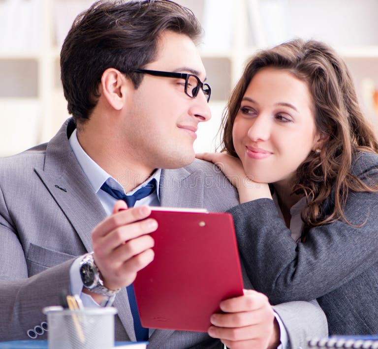 Happy Couple Working in the Same Office Stock Image - Image of ...