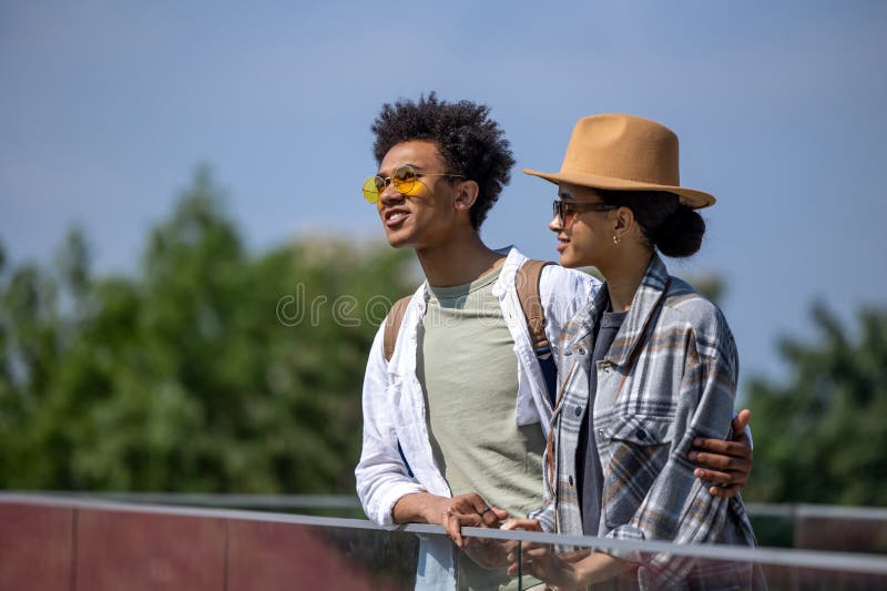 Young Couple Having a Walk and Looking Happy Stock Photo - Image of ...