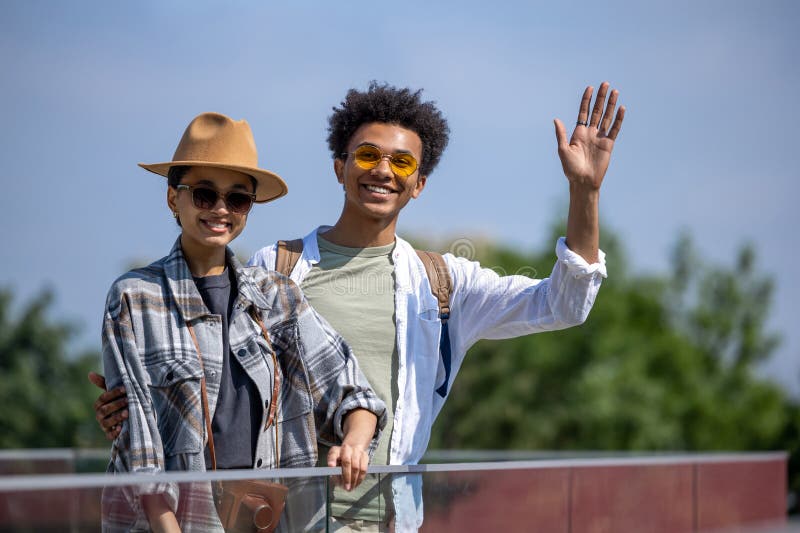 Young Couple Having a Walk and Looking Happy Stock Photo - Image of ...