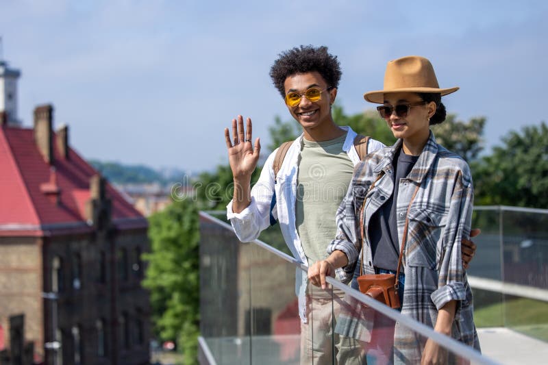 Young Couple Having a Walk and Looking Happy Stock Photo - Image of ...
