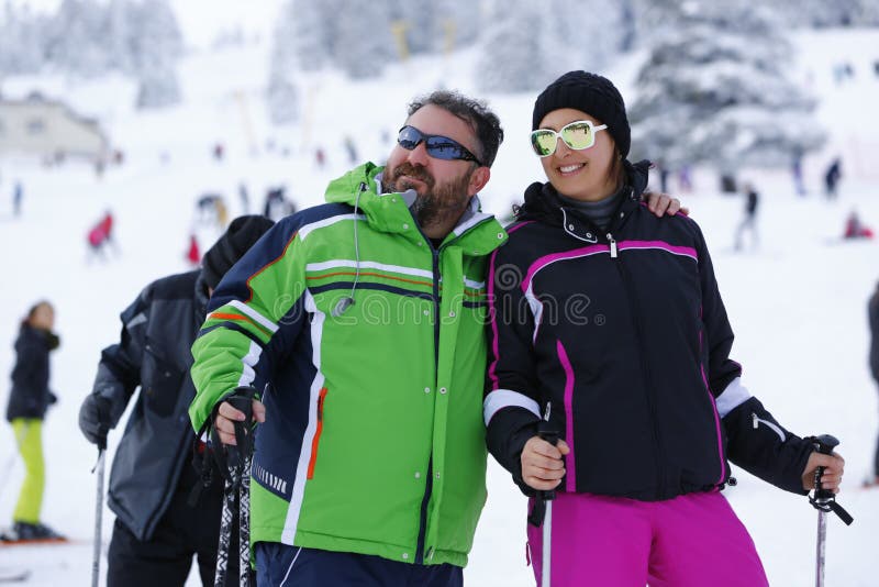 Happy Couples Enjoying in Snow Stock Photo - Image of destination ...