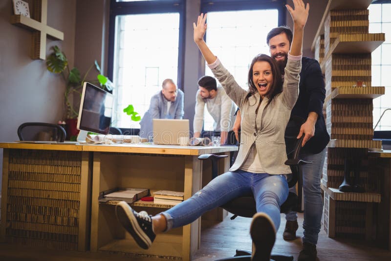 Happy Coworkers Enjoying in Creative Office Stock Image - Image of ...