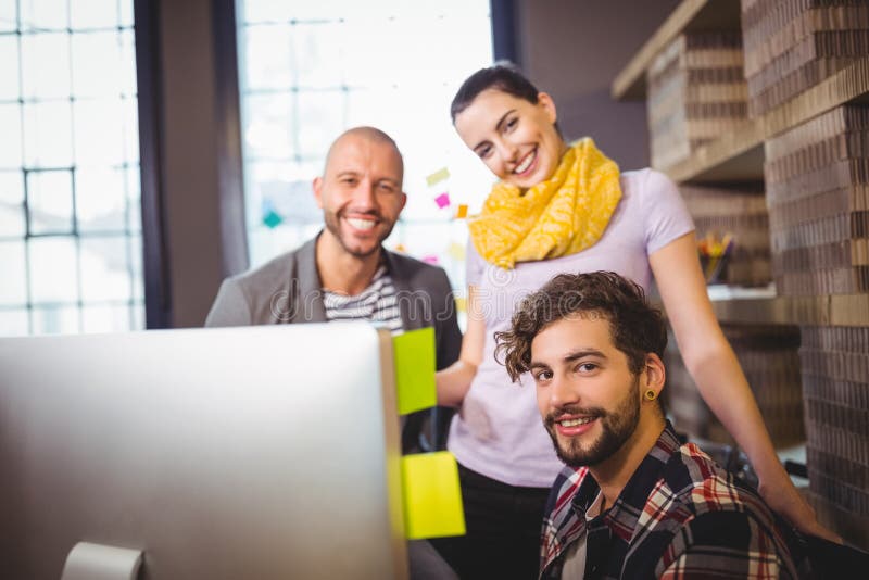 Happy Creative Business People by Computer Stock Image - Image of ...