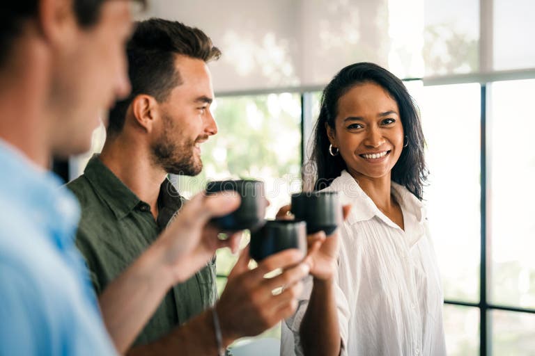 Happy Creative Diverse Colleagues Having Fun while Talking and Drinking ...