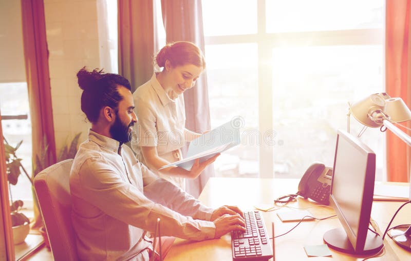 Happy Creative Team with Computer in Office Stock Photo - Image of ...