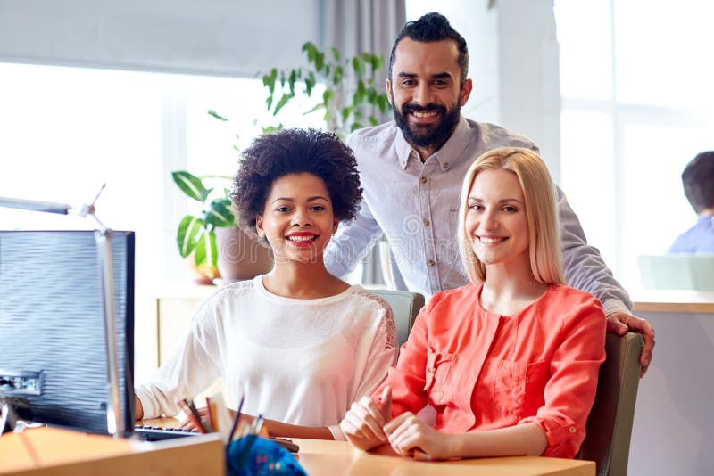 Happy Creative Team with Computer in Office Stock Photo - Image of afro ...