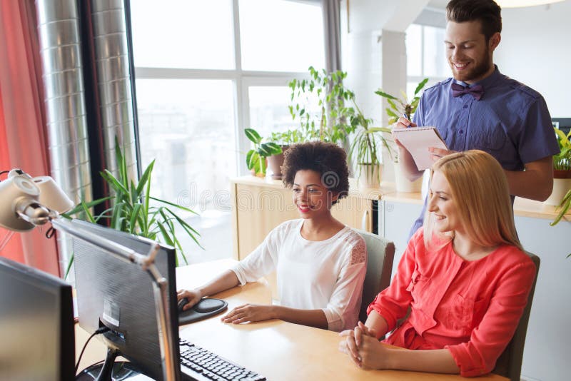 Happy Creative Team with Computer in Office Stock Image - Image of ...