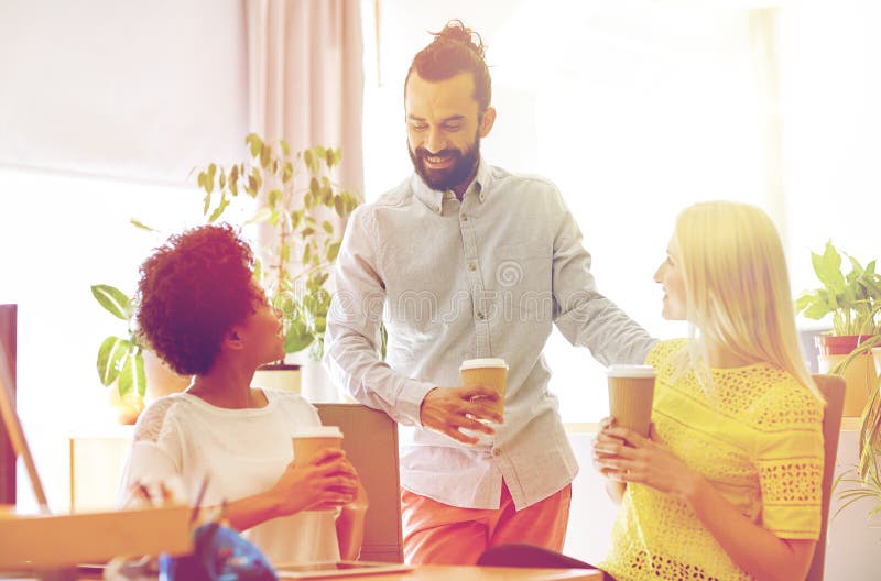 Happy Creative Team Drinking Coffee in Office Stock Photo - Image of ...
