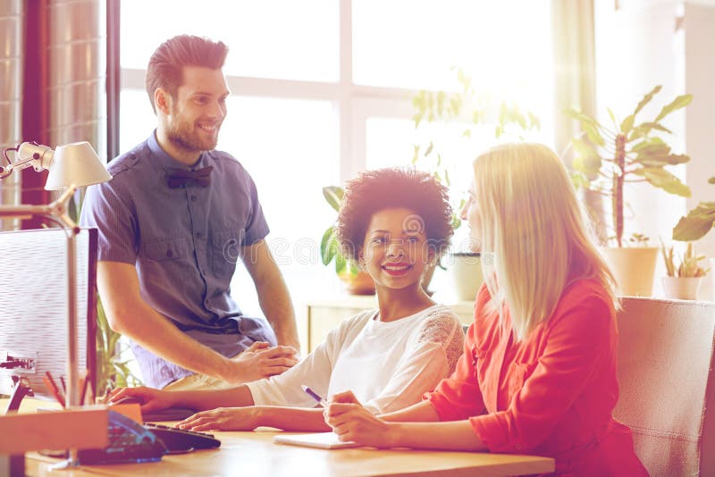 Happy Creative Team Talking in Office Stock Image - Image of indoors ...
