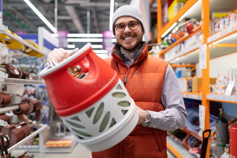 Happy Customer with a Gas Cylinder in His Hands Stock Photo - Image of ...