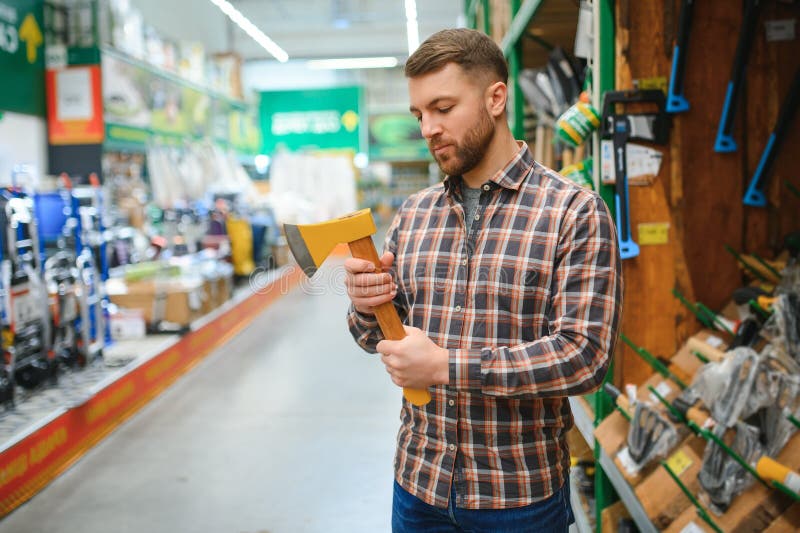Happy Customer in a Hardware Store Buying a New Ax Stock Image - Image ...
