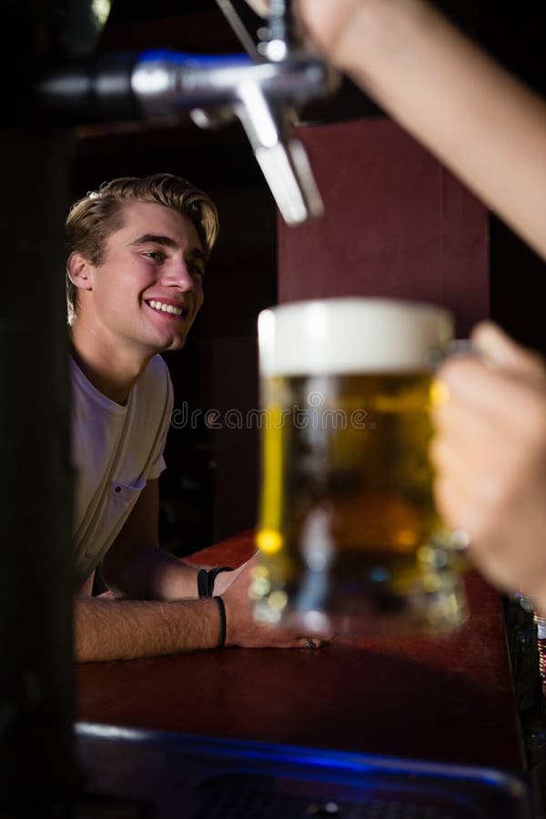 Happy Customer Standing at Counter Stock Image - Image of glass, adult ...