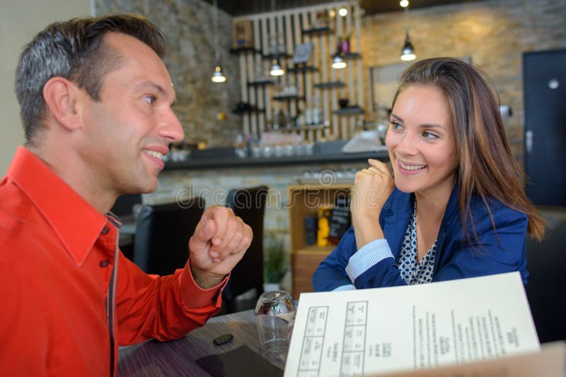 Happy Customer Talking To Shop Assistant Stock Photo - Image of ...