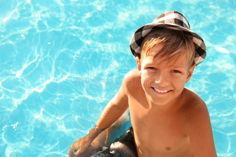 Happy cute boy with hat stock image. Image of pool, relax - 159466711