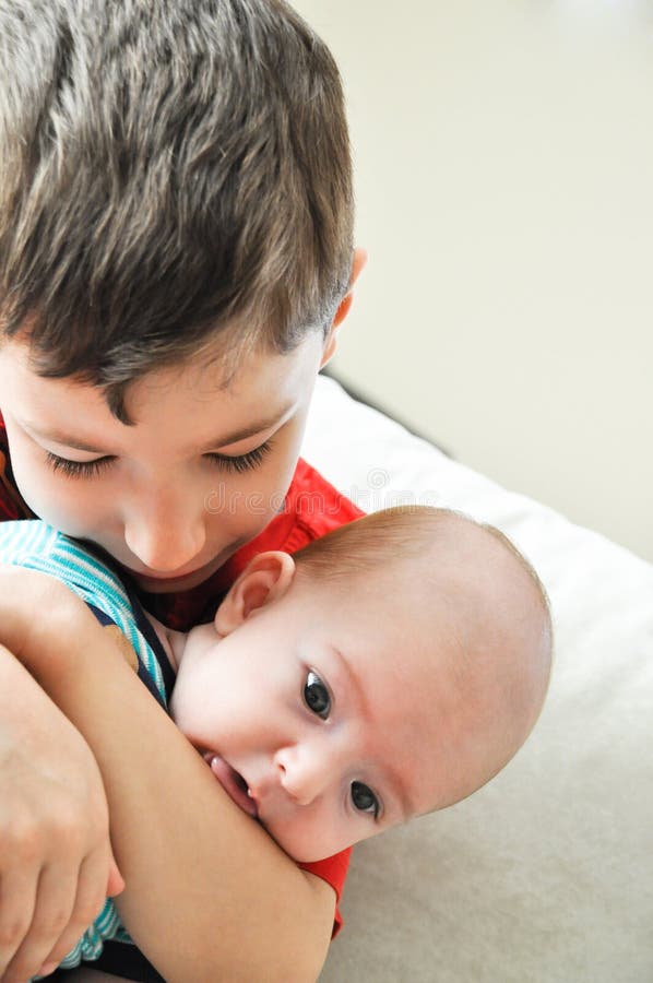 Happy and cute brothers stock photo. Image of generation - 62749580