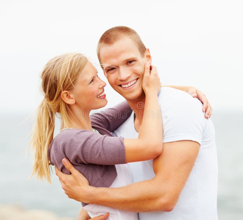 Happy Cute Couple Embracing Eachother Outdoors Stock Image - Image of ...
