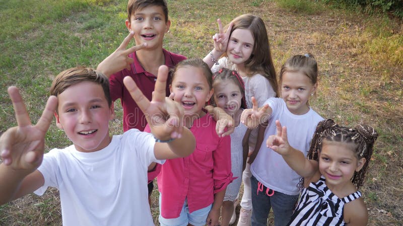 Happy Cute Kids Staring into Camera in Summer Park Stock Video - Video ...