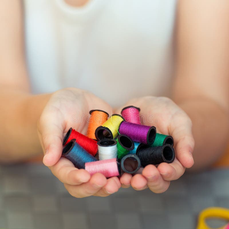 Happy Cute Little Girl Shows Spools of Thread Stock Photo - Image of ...